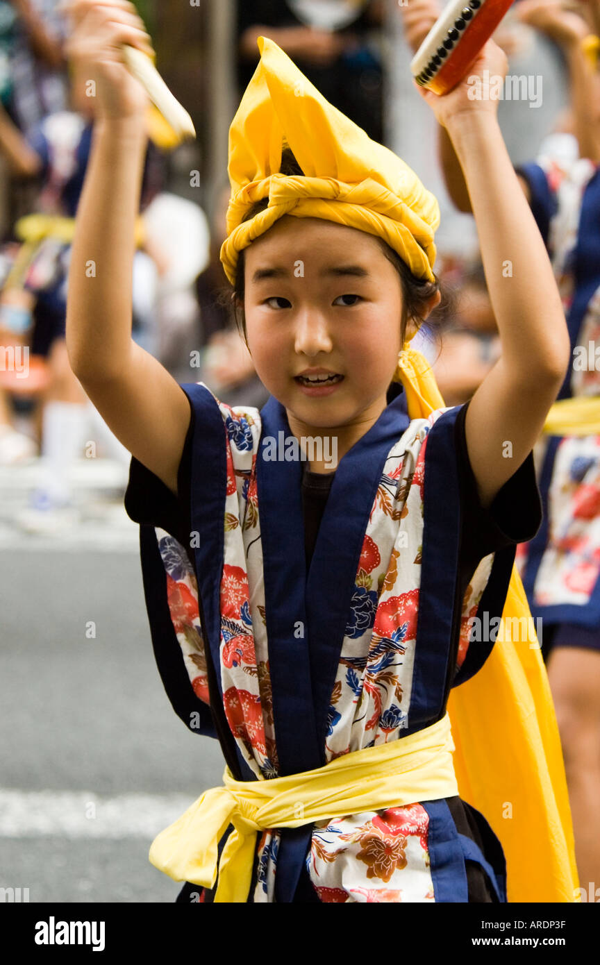 A child performs in a drumming and dancing summer festival in Shinjuku ...