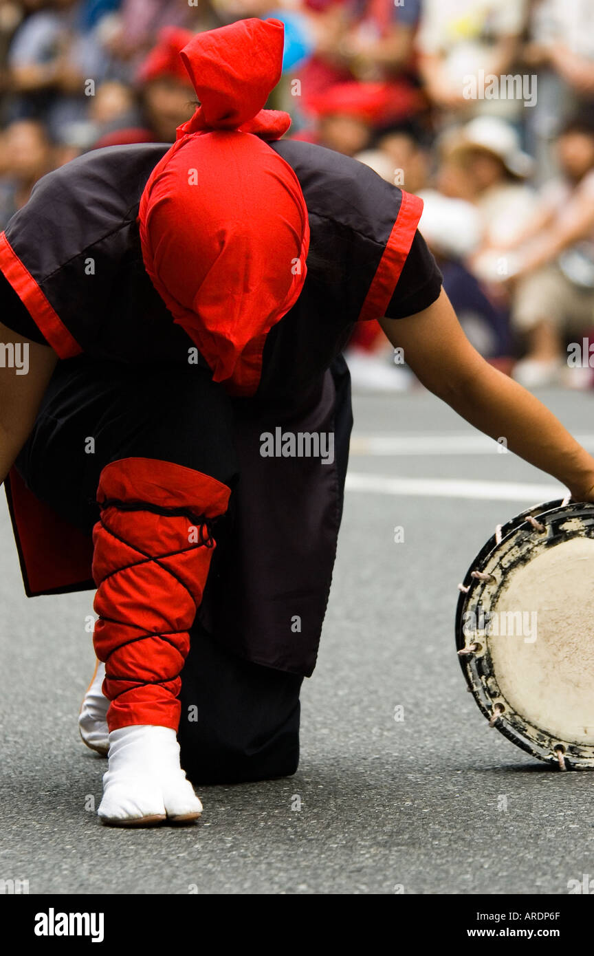 A performer bows at a drumming and dancing summer festival in Shinjuku ...