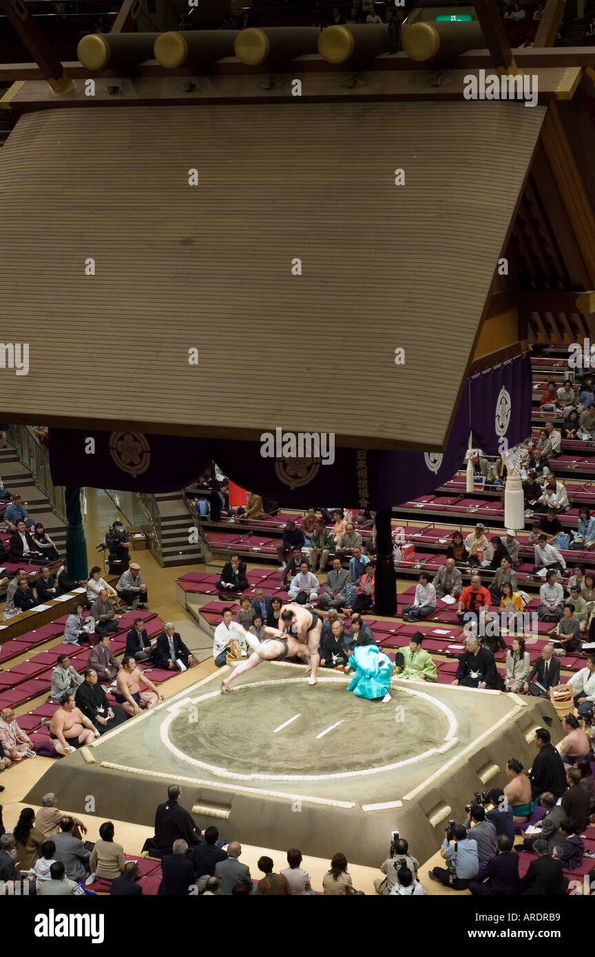 Sumo wrestlers grapple at the Ryogoku stadium in Tokyo Japan Stock ...