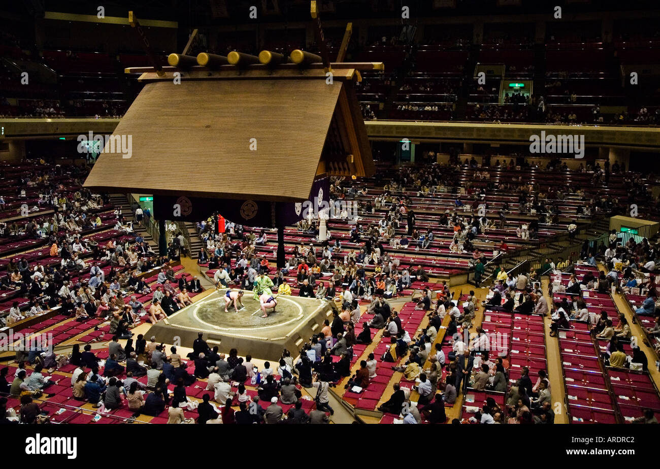 Sumo wrestlers grapple at the Ryogoku stadium in Tokyo Japan Stock ...