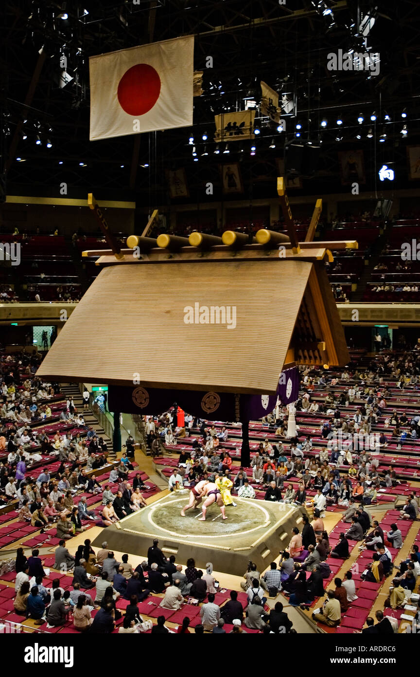 Sumo wrestlers grapple at the Ryogoku stadium in Tokyo Japan Stock ...
