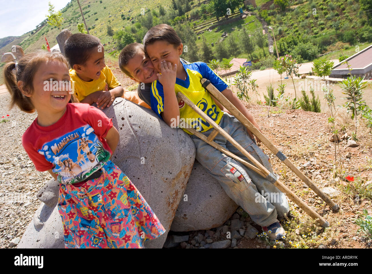 Village children one disabled with a pair of crutches Islahiye Yesemek ...