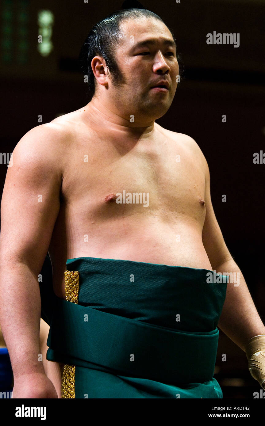 A sumo wrestler prepares for his bout at the Ryogoku stadium in Tokyo ...