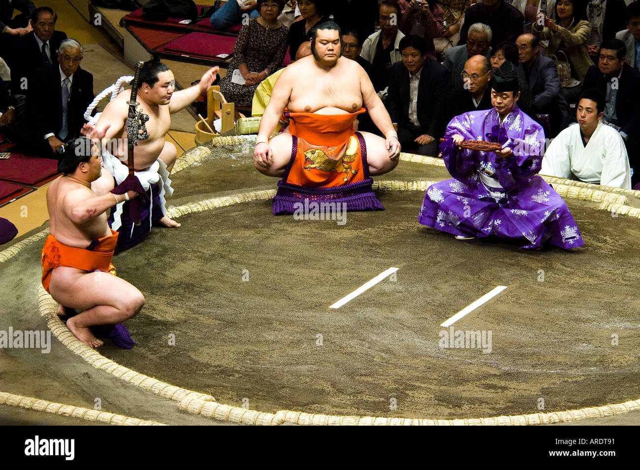Sumo wrestlers perform a ceremony at the Ryogoku stadium in Tokyo Japan ...