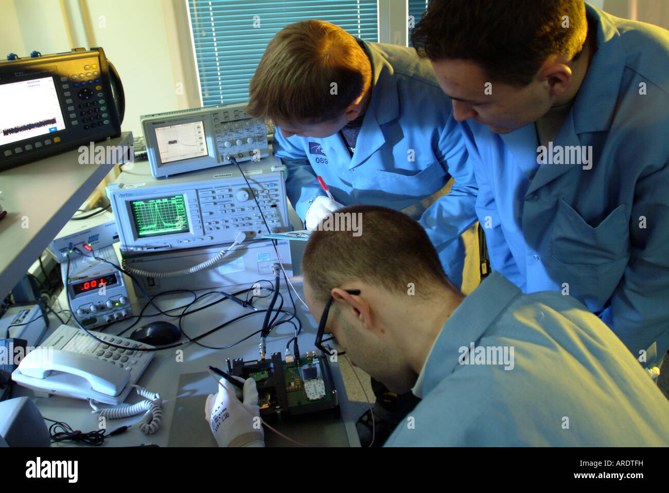 Mobile telephone testing and repairs Stock Photo - Alamy