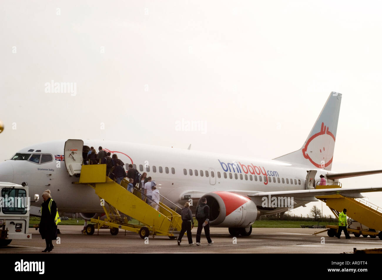 Passengers board short haul aircraft Stock Photo - Alamy