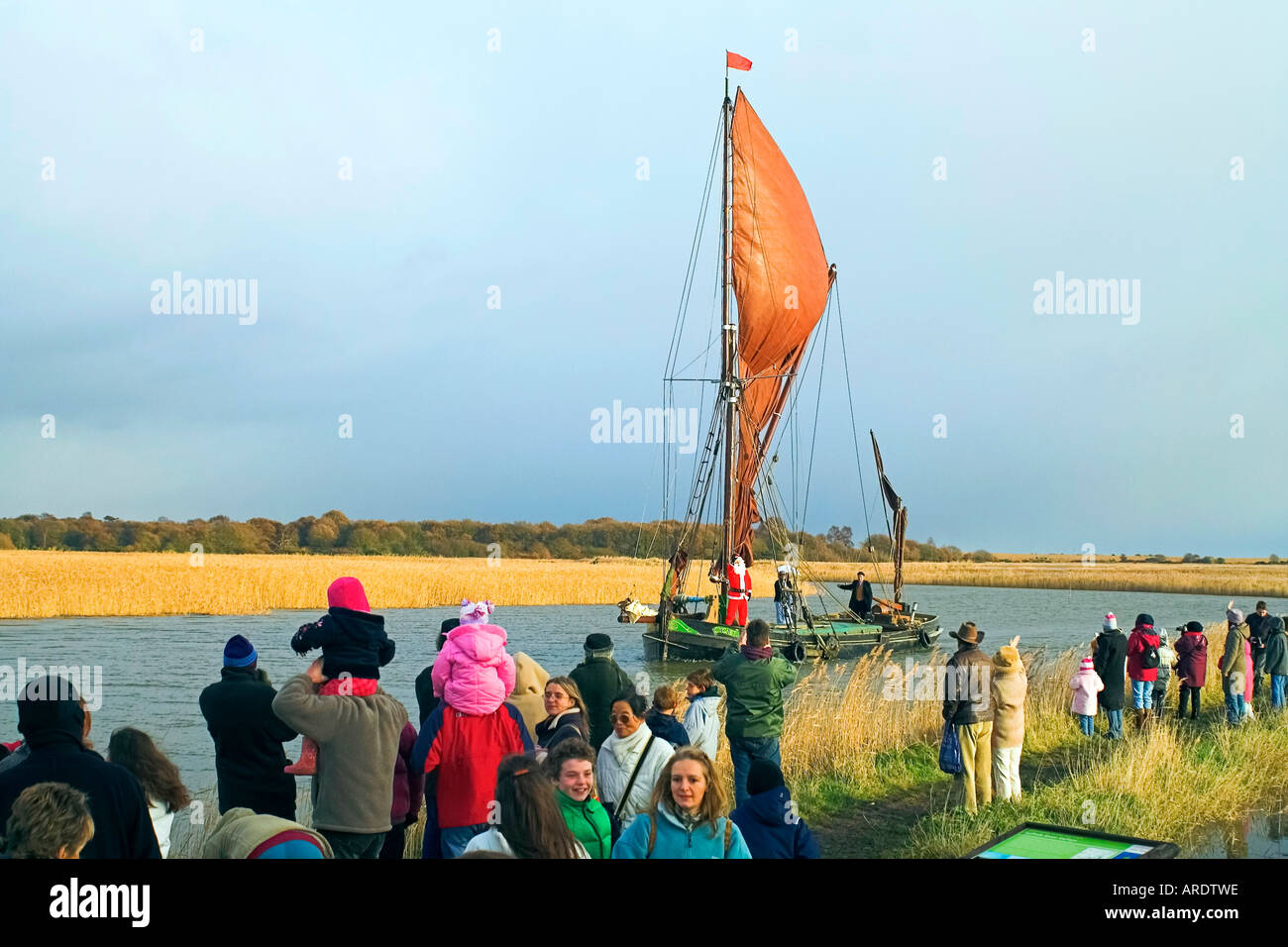 Santa Claus arrives at Snape Maltings by Barge River Alde Suffolk ...