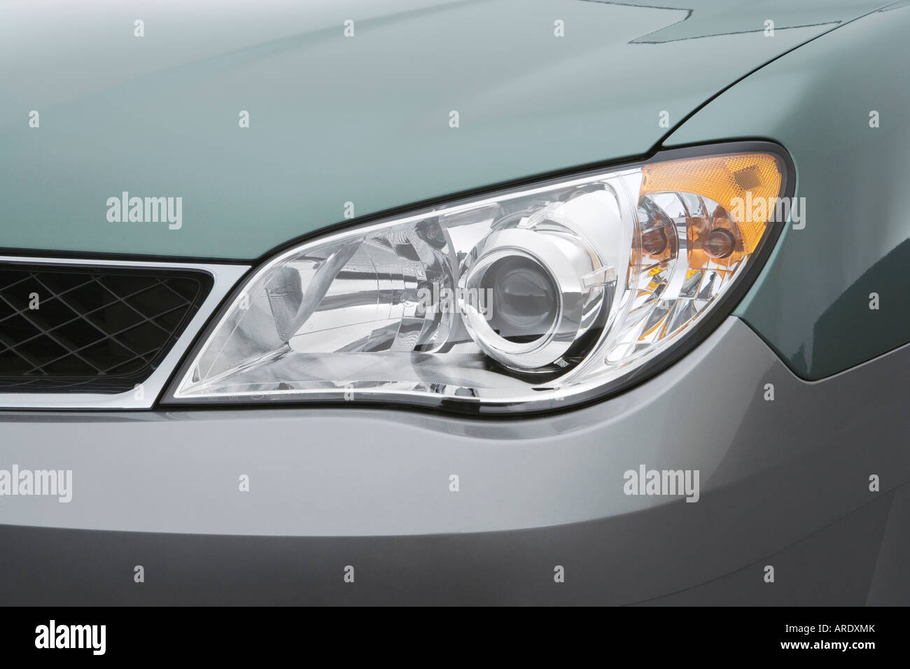 2007 Subaru Impreza Outback Sport in Green - Headlight Stock Photo - Alamy