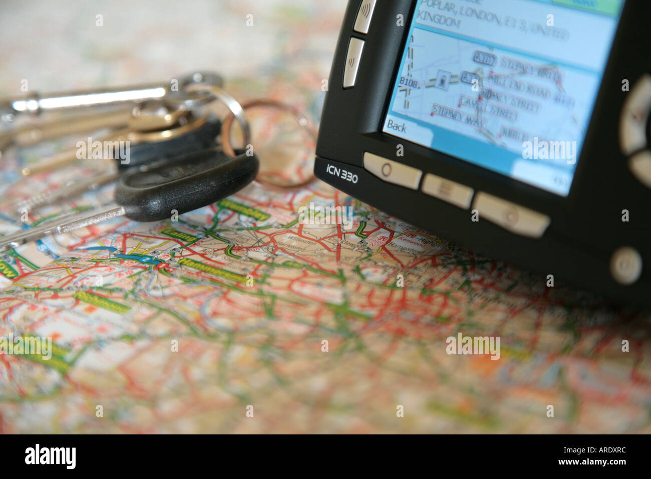 satellite navigator and road map Stock Photo - Alamy