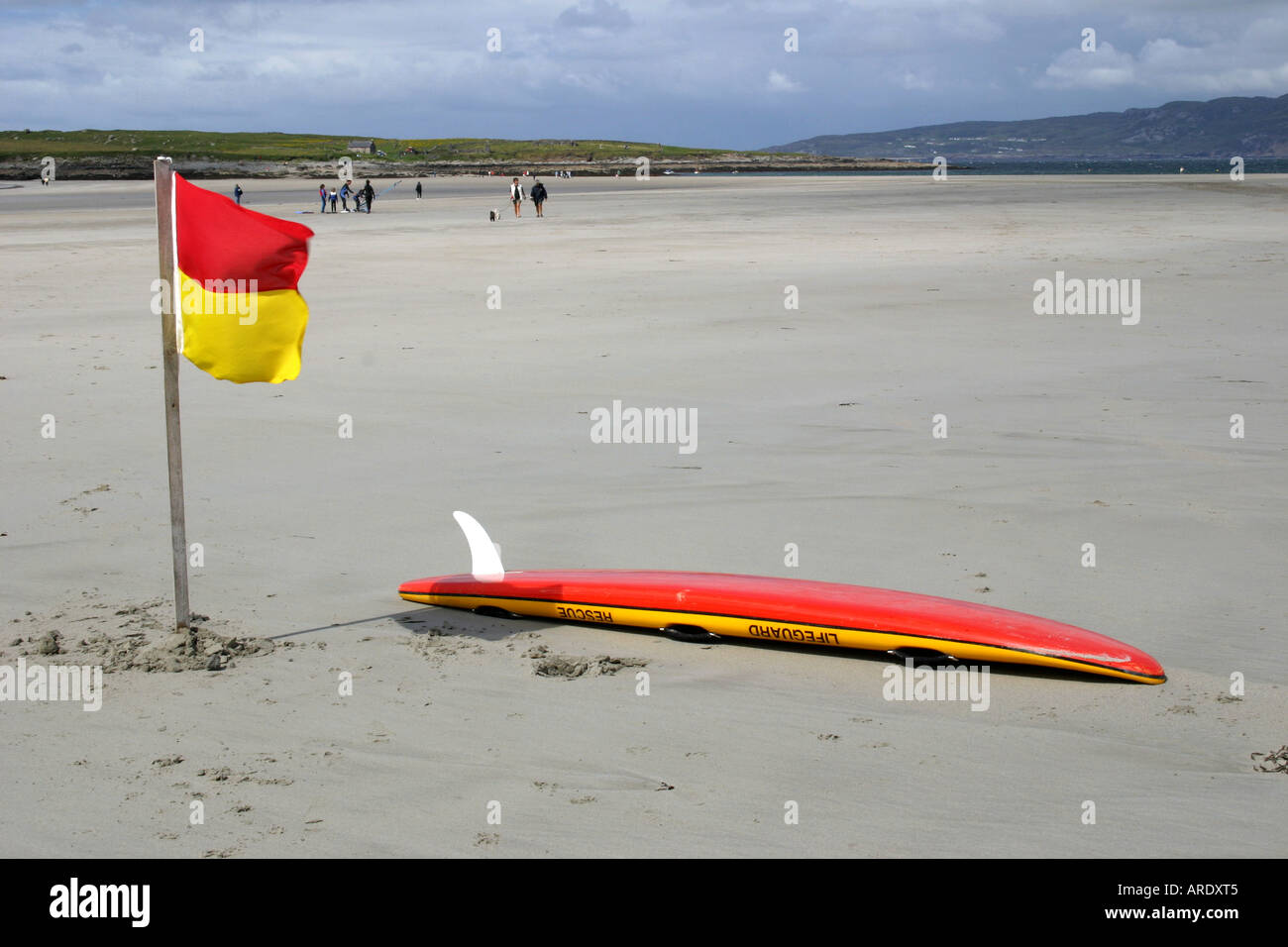 surf board and flag on beach in Narin, County Donegal, Ireland Stock ...