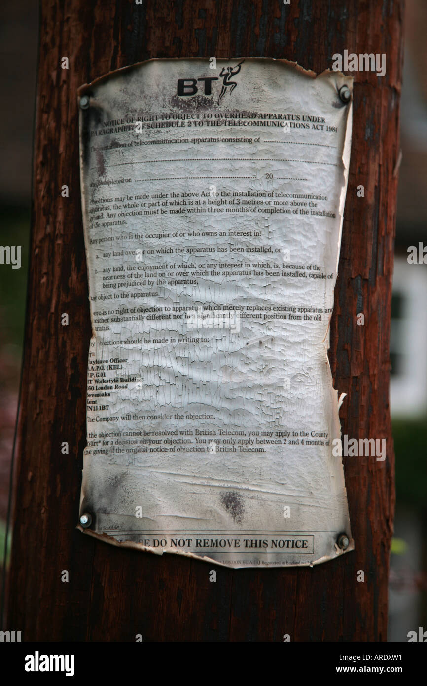 BT notice on telegraph pole Stock Photo - Alamy