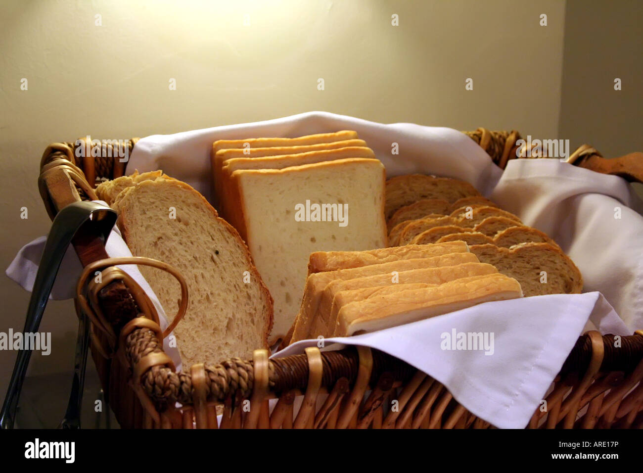 Sliced bread in a basket part of restaurant buffet breakfast Stock ...