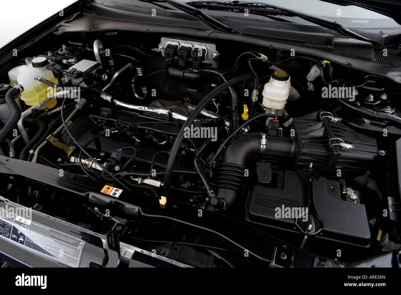 2006 Ford Escape XLS in Blue - Engine Stock Photo - Alamy