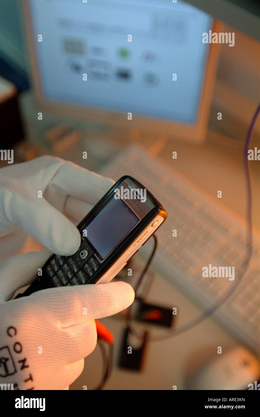 Mobile telephone testing and repairs Stock Photo - Alamy