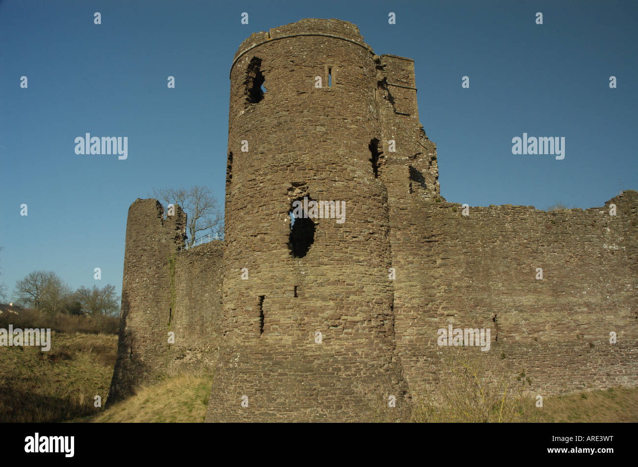 Two round towers and walls of ruined castle Stock Photo - Alamy