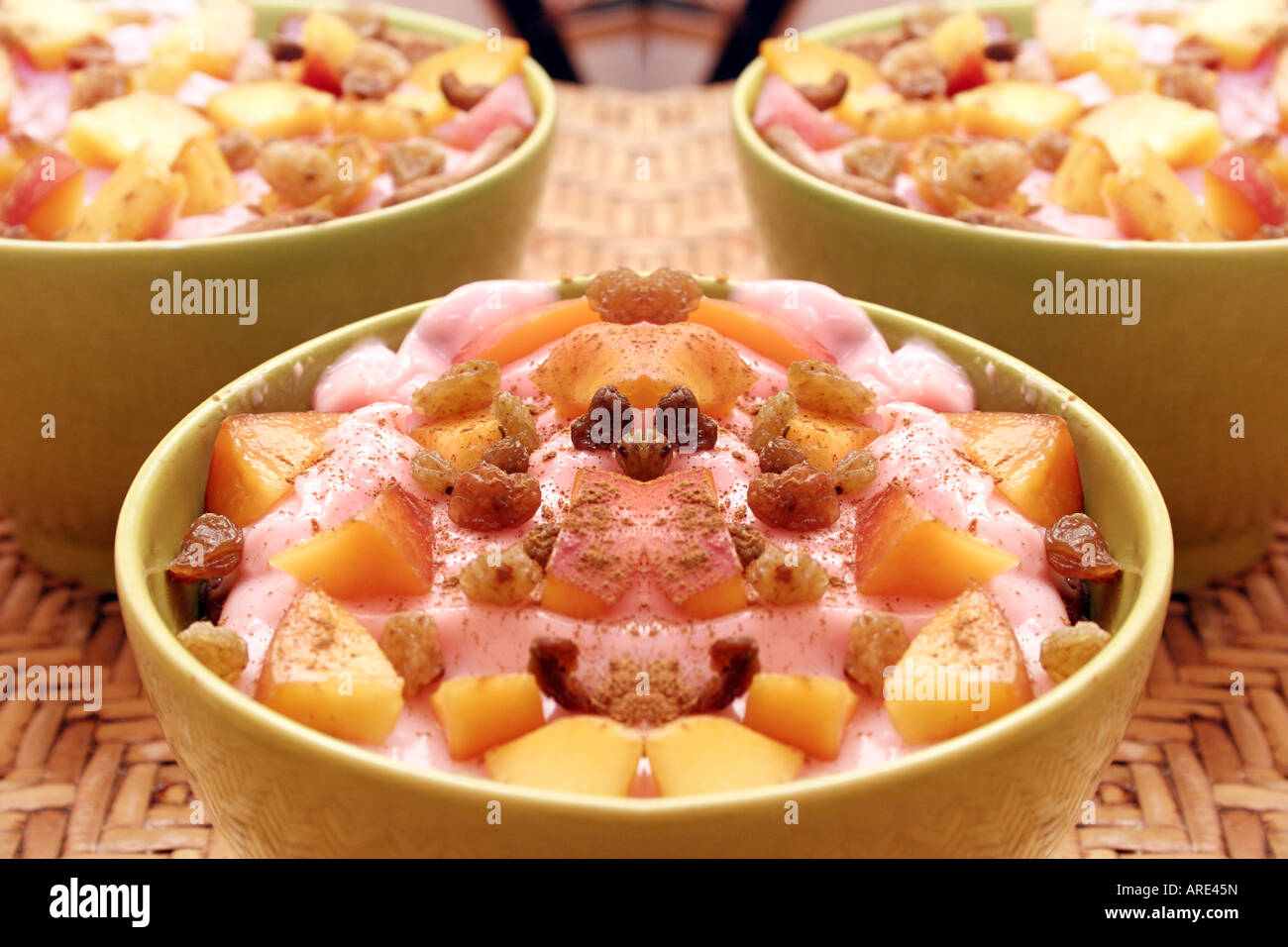 Pink pudding with fruits and cinnamon Stock Photo - Alamy