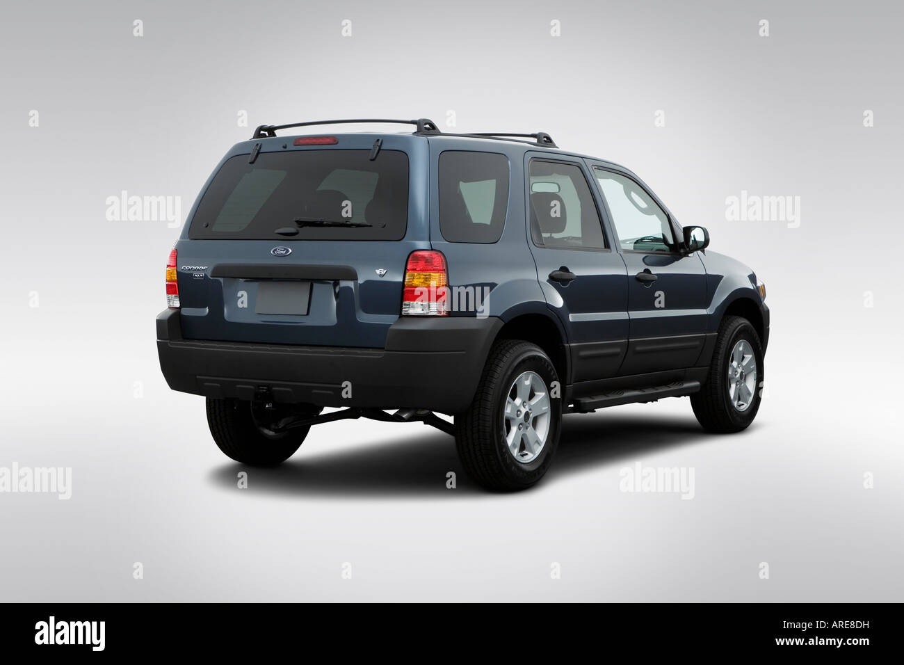 2006 Ford Escape XLT in Blue - Rear angle view Stock Photo - Alamy