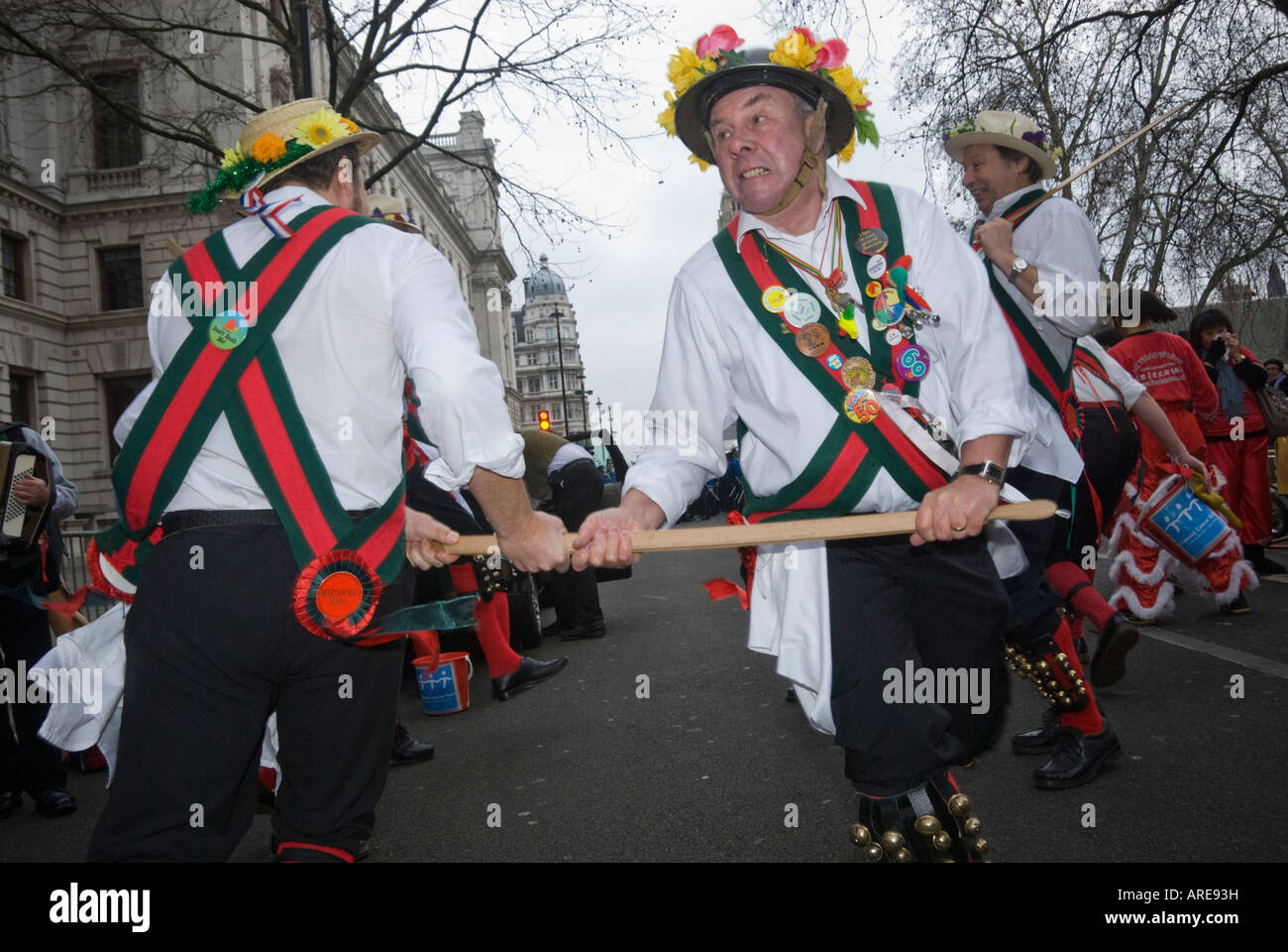 Male Morris Dancers perform sword dance on street in Parliament Square ...