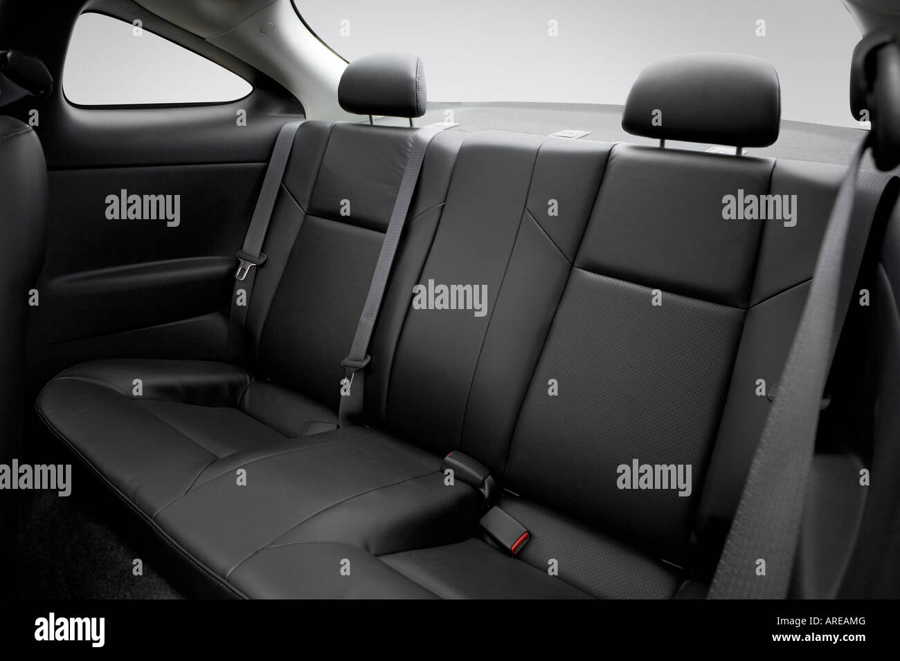 2006 Chevrolet Cobalt SS in Yellow - Rear seats Stock Photo - Alamy