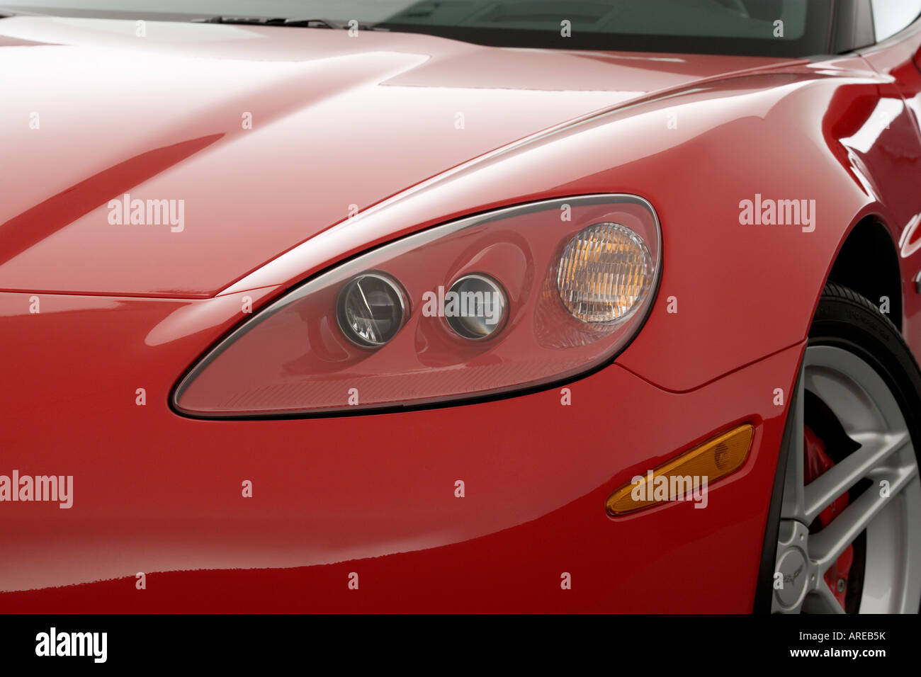 2006 Chevrolet Corvette Z06 in Orange - Headlight Stock Photo - Alamy