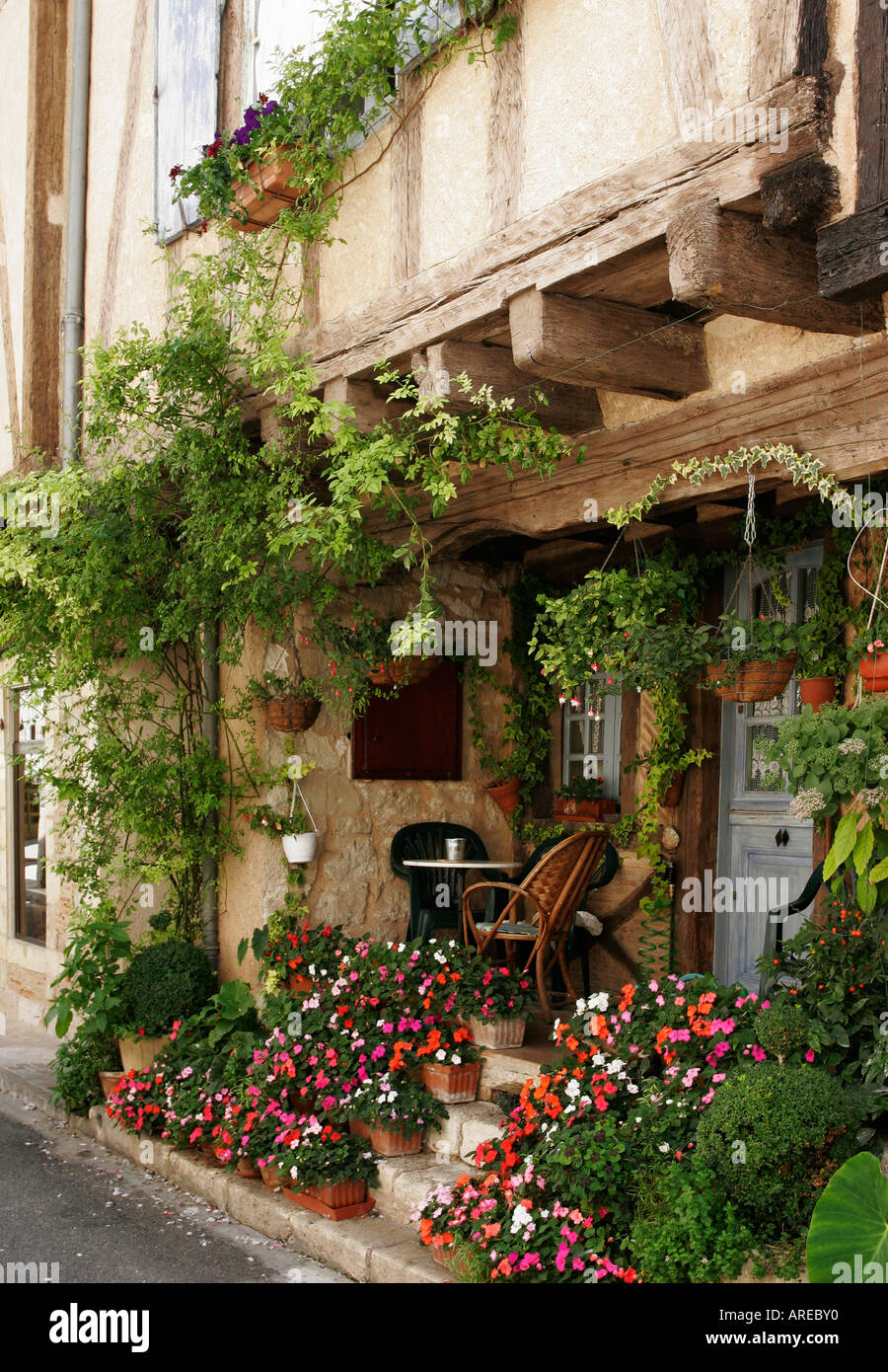Floral facade of a medieval timber frame house in France Stock Photo ...