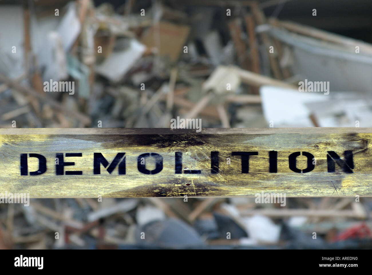 DEMOLITION sign with demolished building rubble in background Stock ...