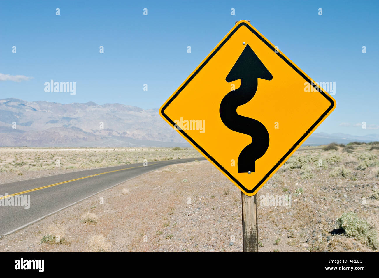 Winding road sign cut out hi-res stock photography and images - Alamy