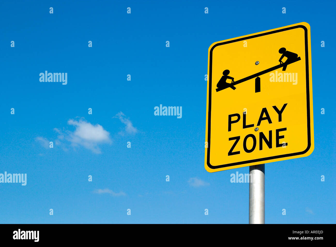 Children playing on teeter totter hi-res stock photography and images ...