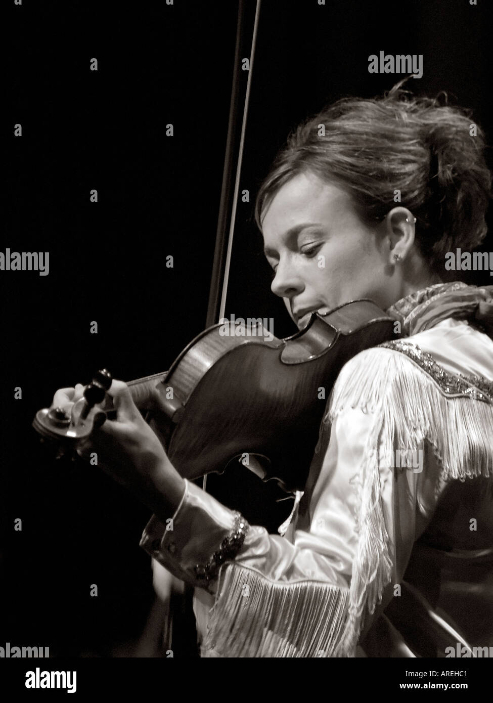 Female violinist in orchestra hi-res stock photography and images - Alamy