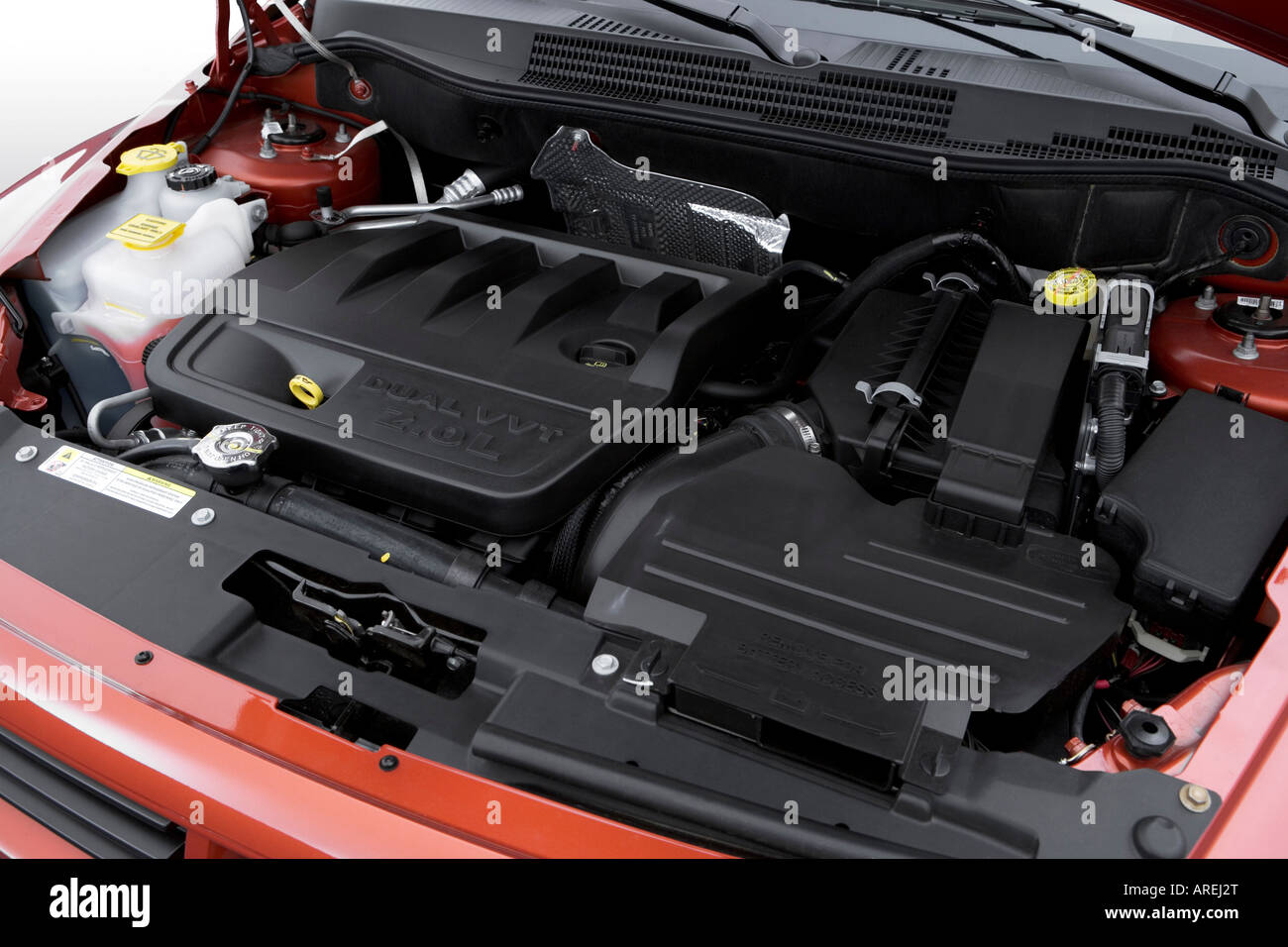 2007 Dodge Caliber SE in Orange - Engine Stock Photo - Alamy