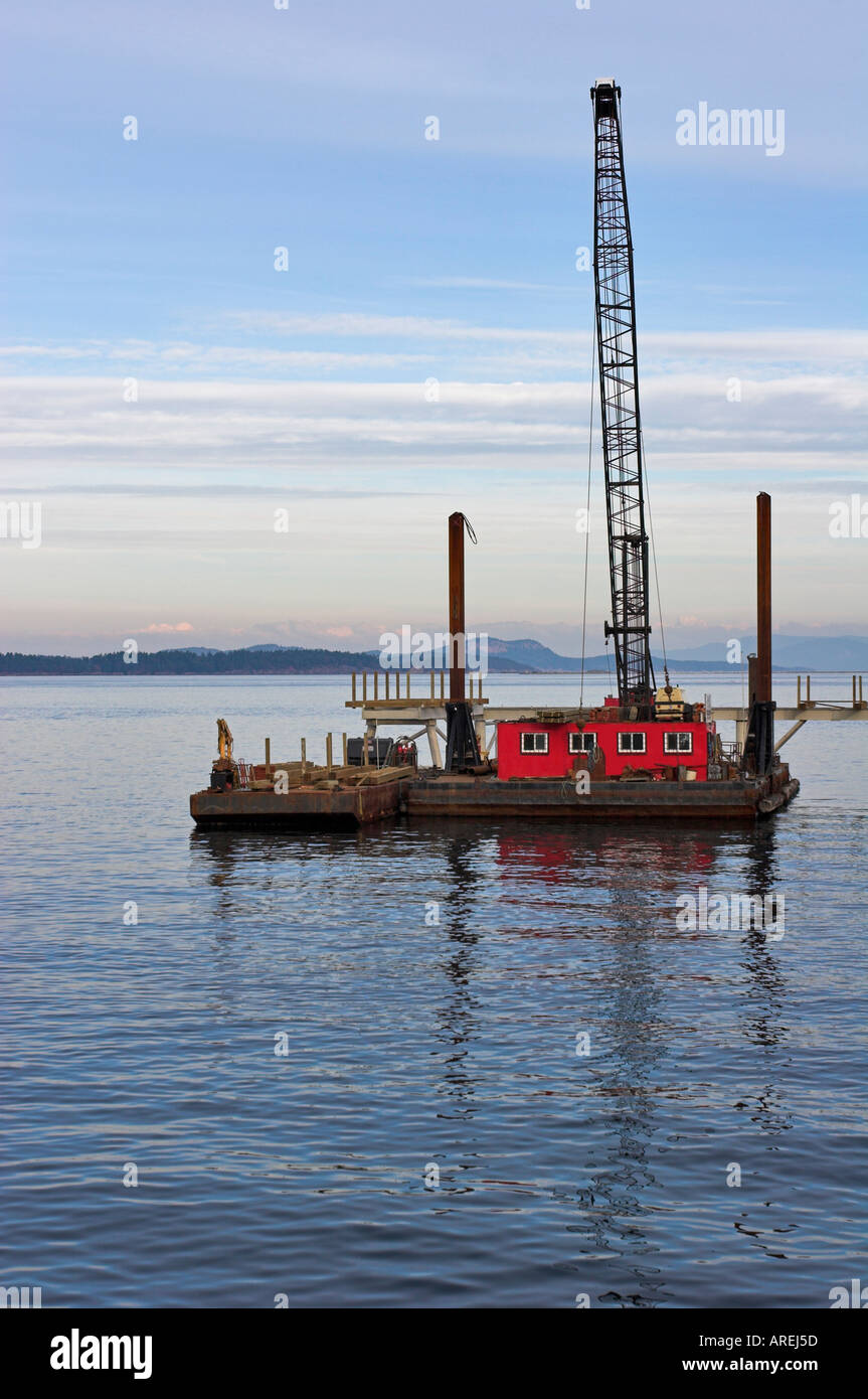 Crane on barge building wharf in harbor Sidney Saanich Peninsula ...
