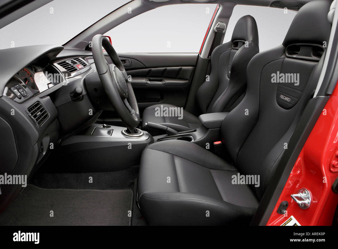 2006 Mitsubishi Lancer Evolution IX in Red - Front seats Stock Photo ...