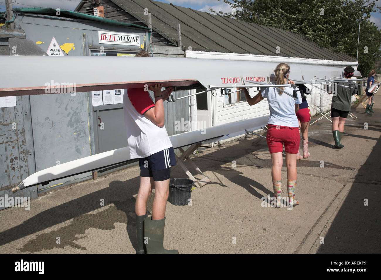 Carrying rowing boat hi-res stock photography and images - Alamy