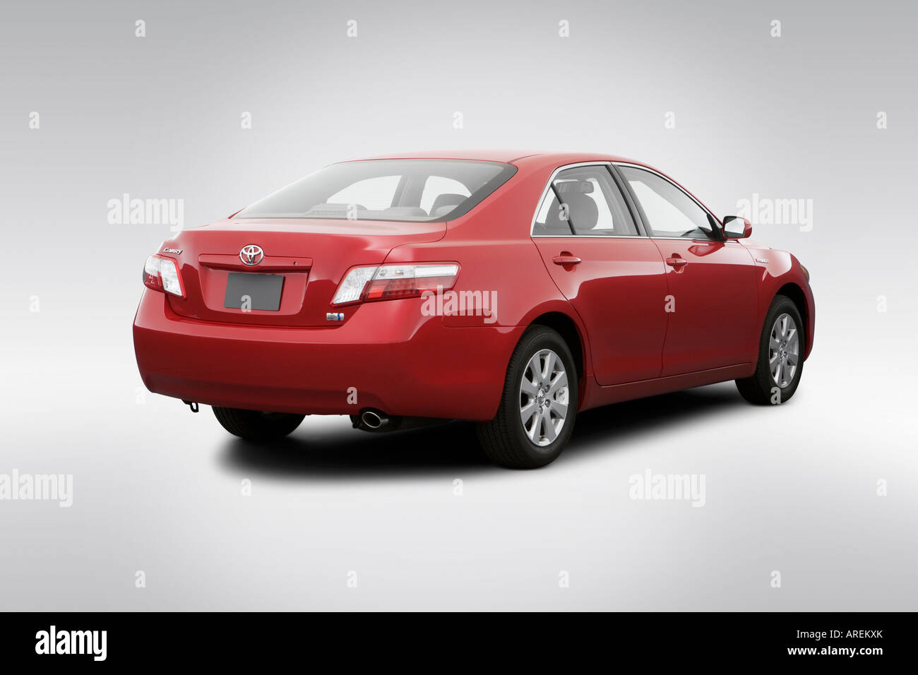 2007 Toyota Camry Hybrid in Red - Rear angle view Stock Photo - Alamy