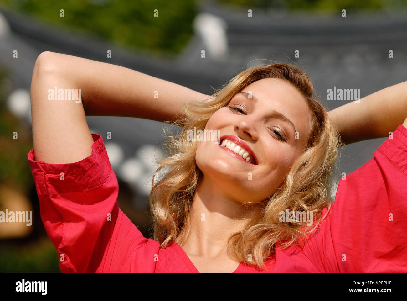 Relaxed attractive woman Stock Photo - Alamy