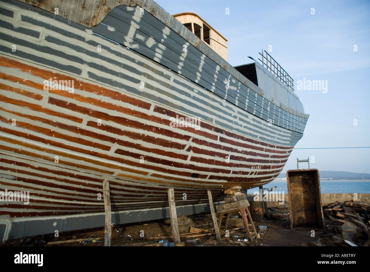 Boats in Essaouira shipyard port Stock Photo - Alamy