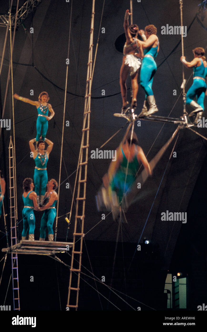 circus performer trapeze artist spotlight Stock Photo - Alamy