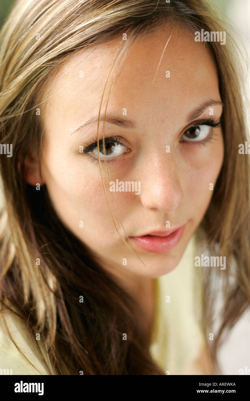 Young girl looking sad Stock Photo - Alamy