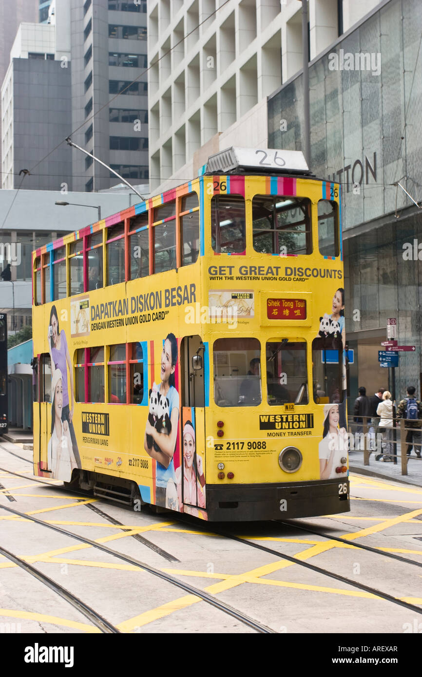 Yellow tram in Central, Hong Kong Stock Photo - Alamy