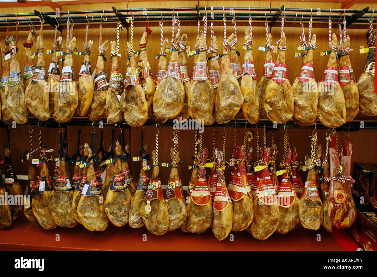 Lines of jamon (ham) for sale in a Spanish supermarket Stock Photo - Alamy