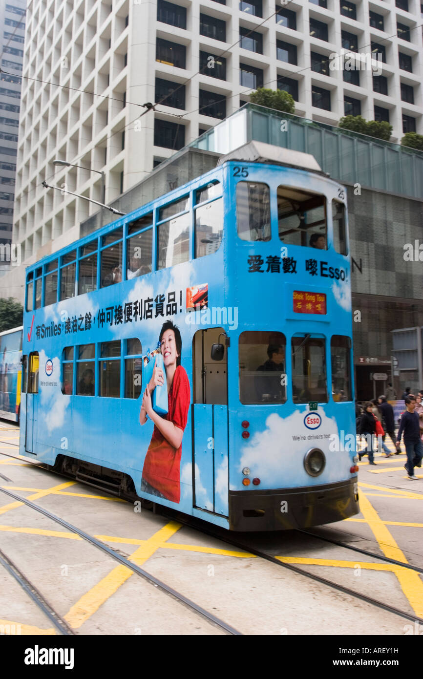 Esso blue tram in Central, Hong Kong Stock Photo - Alamy