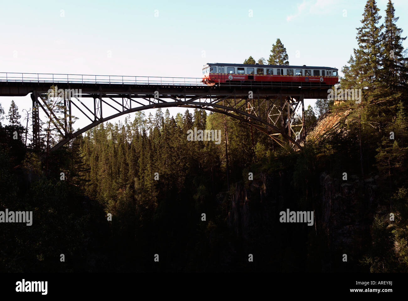 A train of the Swedish Inland Railway crossing the steel bridge at ...