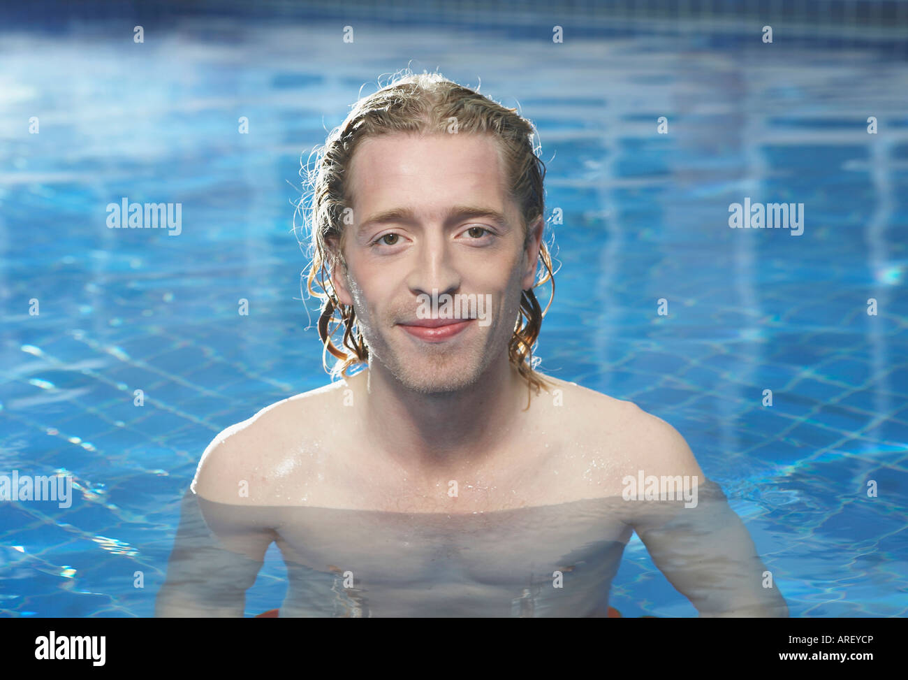 Portrait of a man in a swimming pool Stock Photo - Alamy