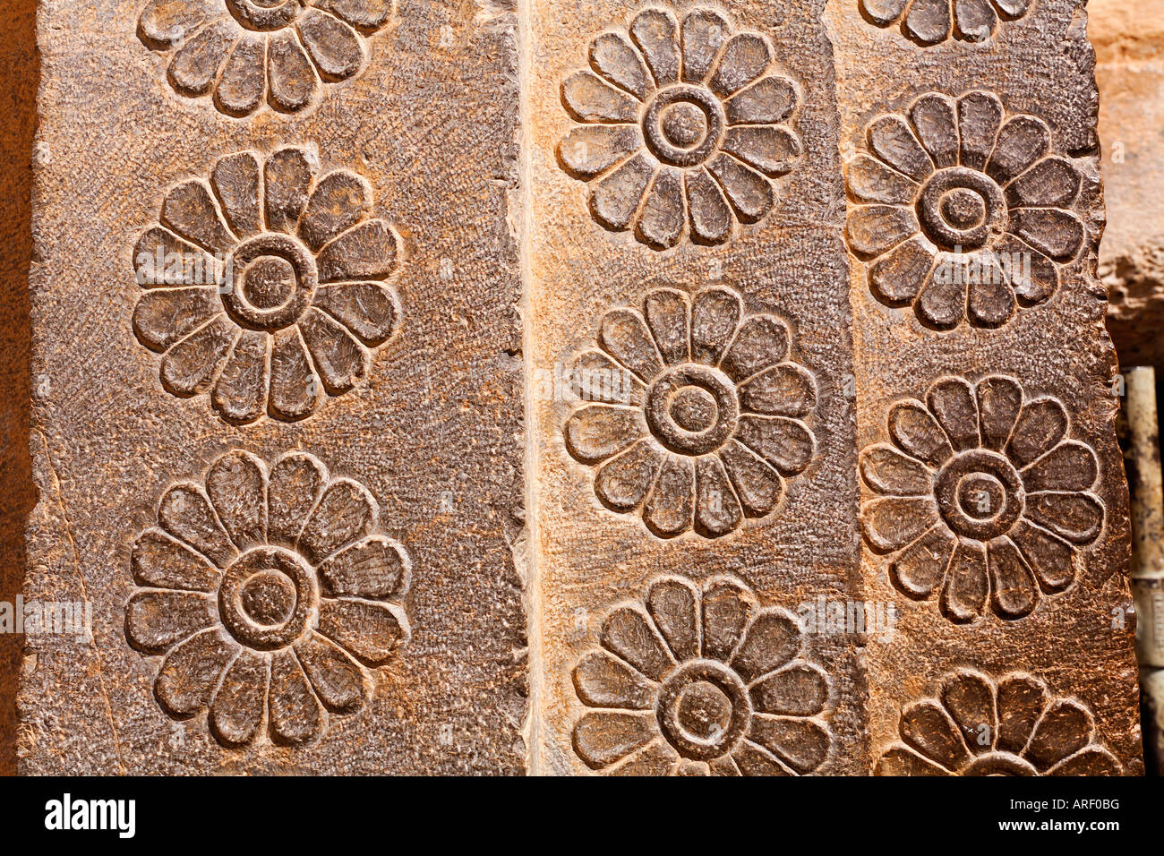 Flower motif bas reliefs decorating the tomb of Artaxerxes II at ...