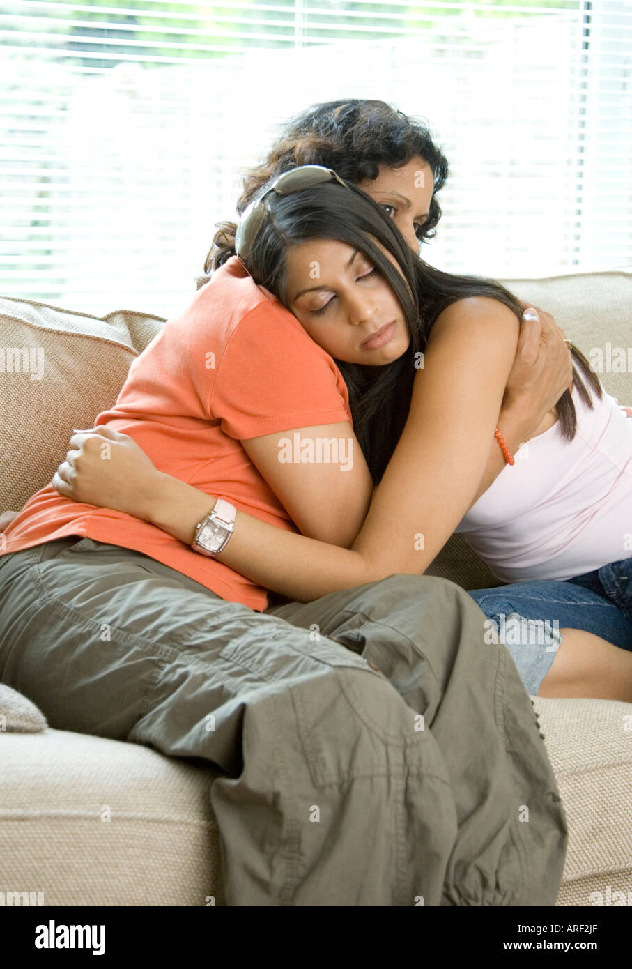 Mom Comforting Teen Daughter High Resolution Stock Photography and Images - Alamy