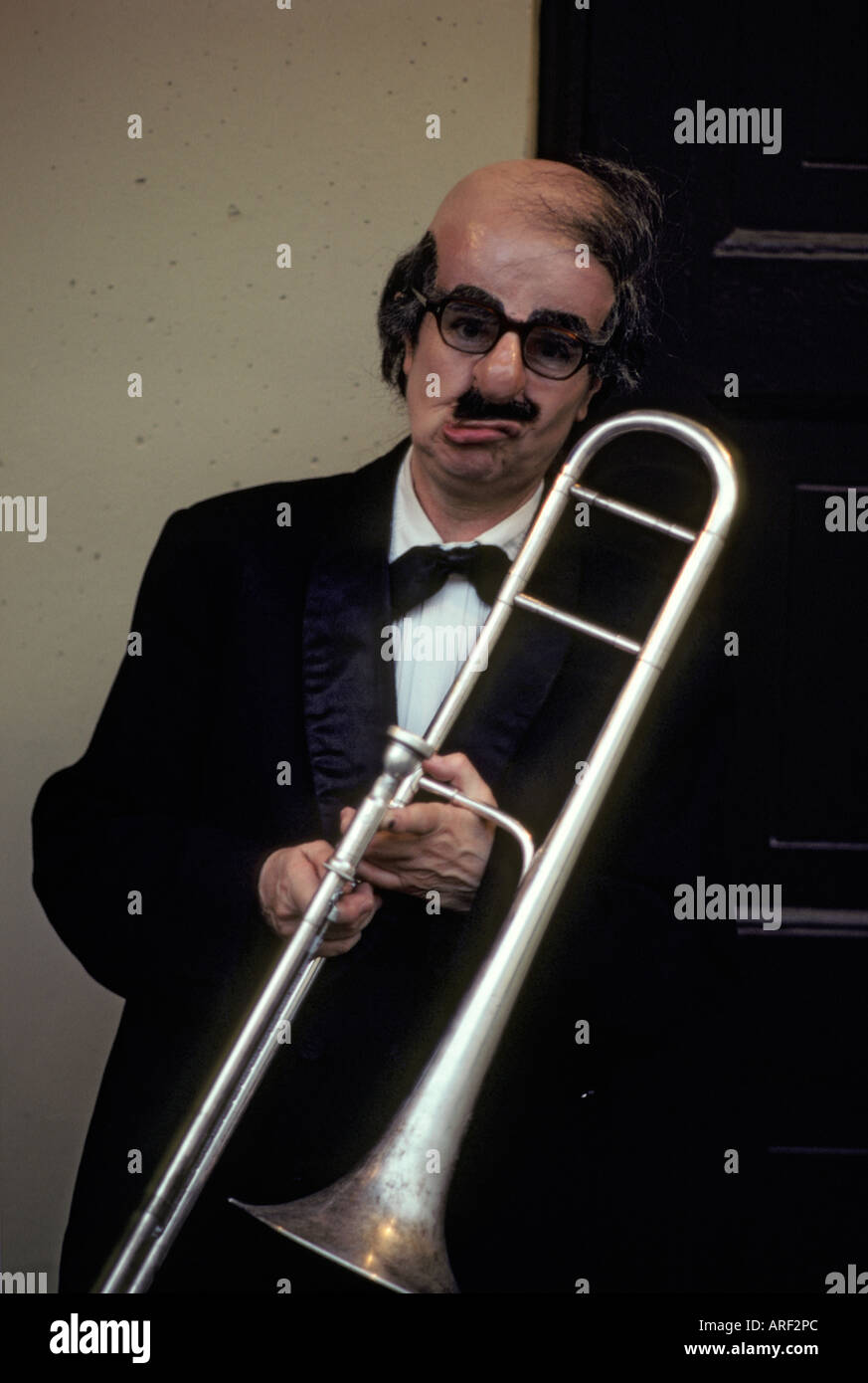 circus performers back stage clown w trombone Stock Photo - Alamy