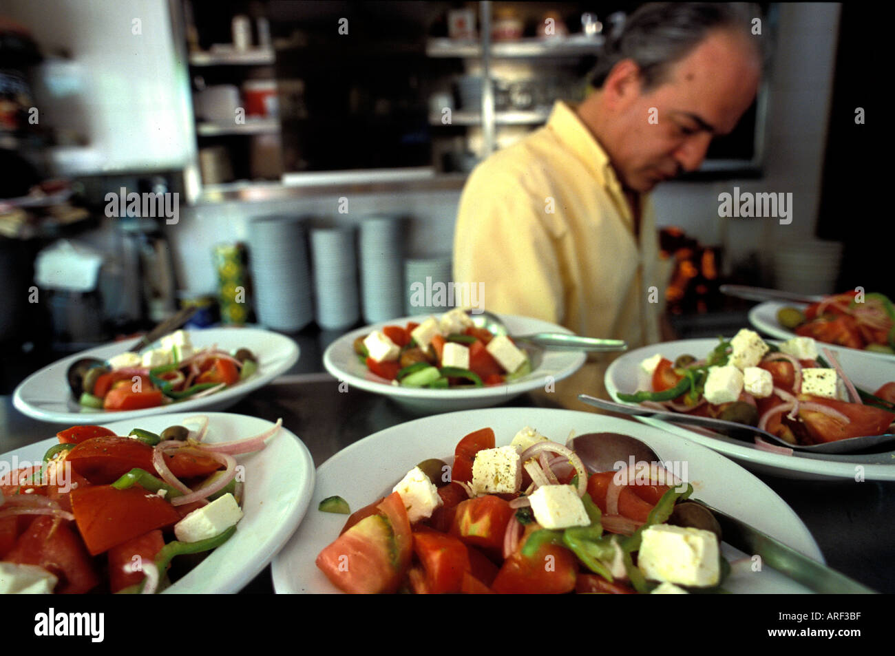 Traditional Greek salad prepared in taverna Plaka Old Quarter of Athens ...