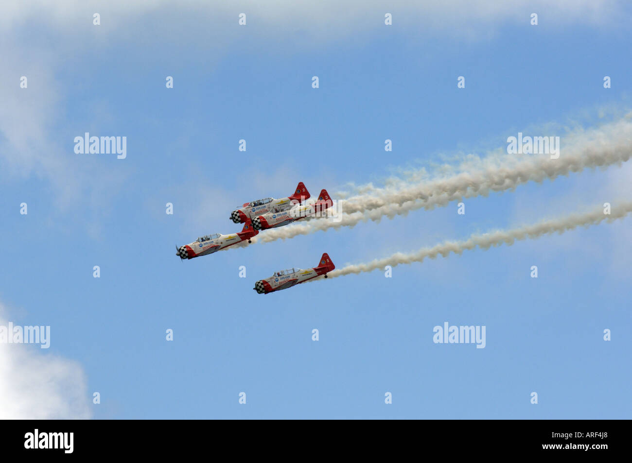 Group of four stunt planes from the Aeroshell flying group perform at ...