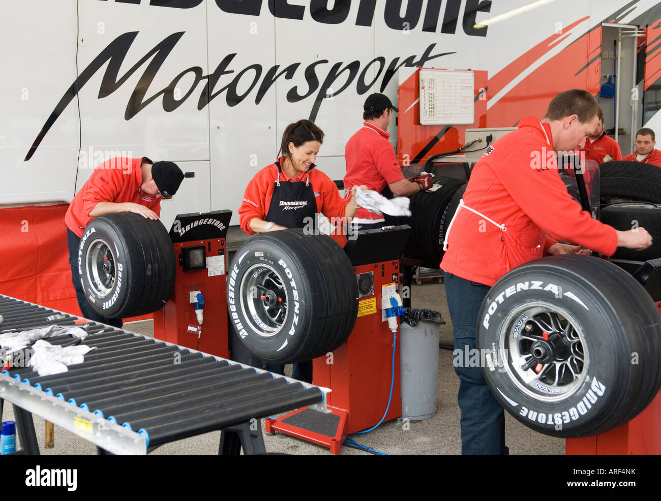 Bridgestone Formula 1 crew works on tires Jan. 2008 Stock Photo - Alamy