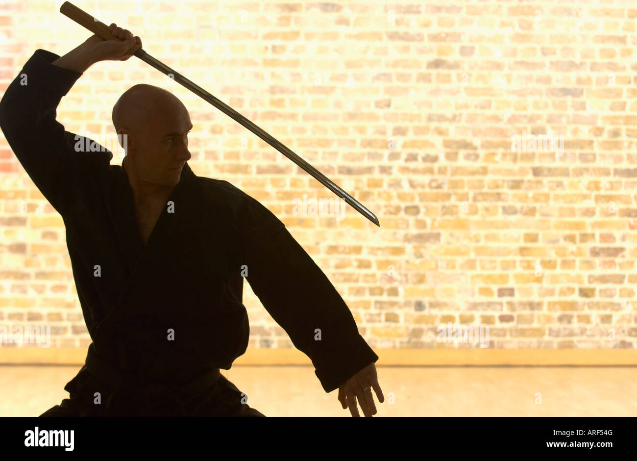 Karate man with Samurai sword Stock Photo - Alamy